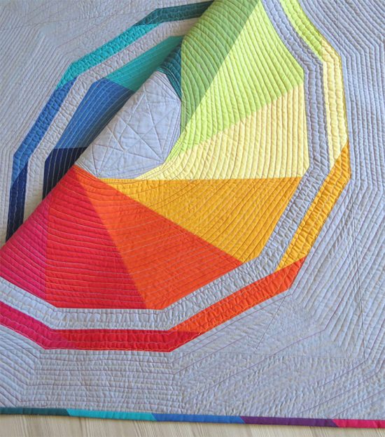 Modern geometric patchwork quilt pattern