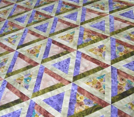 Triangle patchwork quilt pattern-sew equilateral triangles.