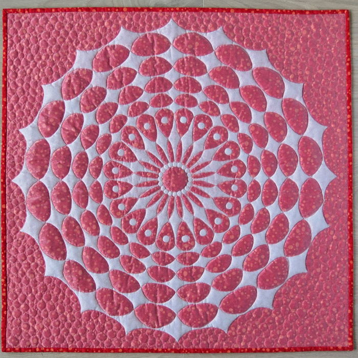 Shadow trapunto quilt and colored thread - Geta's Quilting Studio